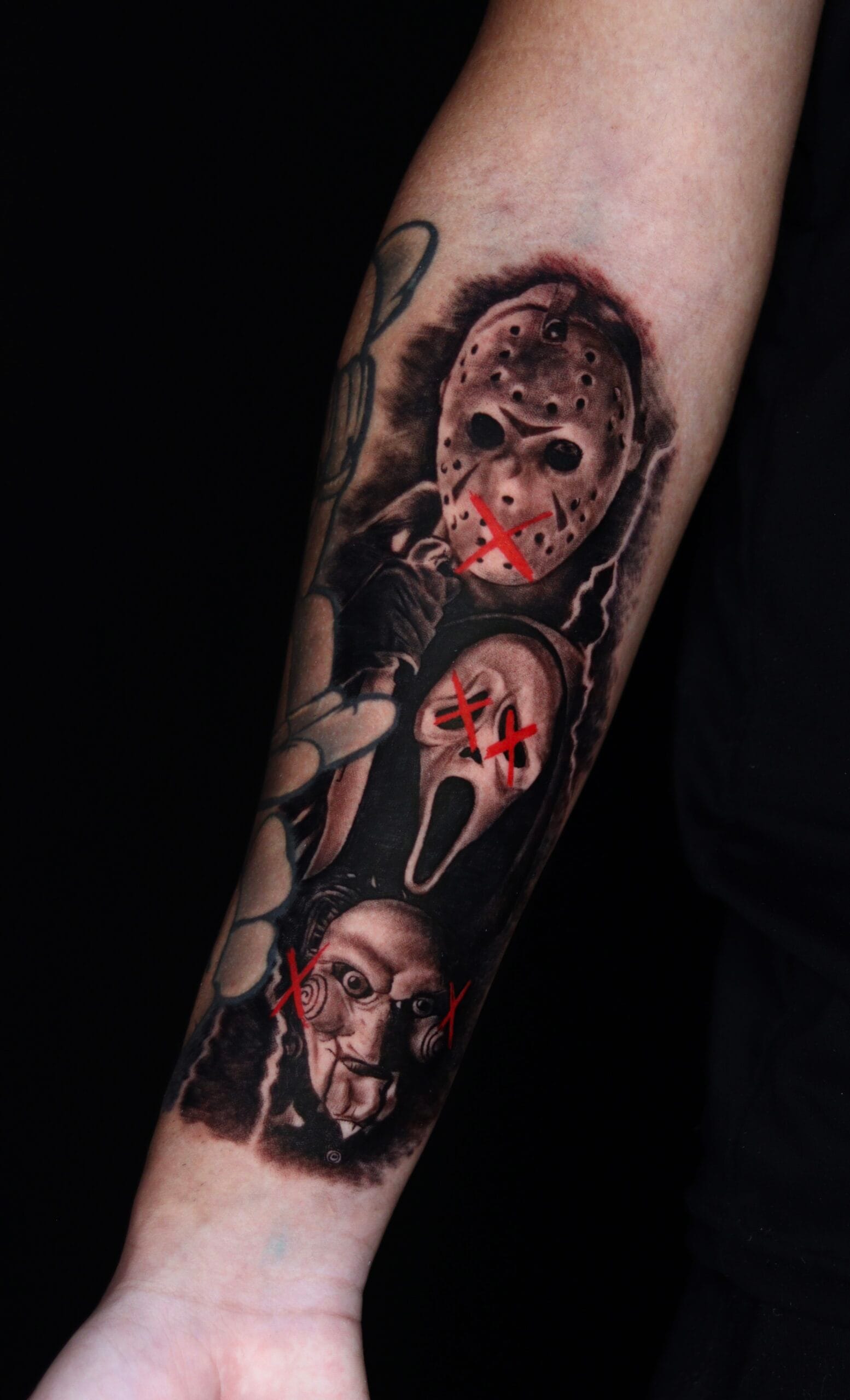 Forearm Tattoo of horror movie icons - Best tattoo shop in Los Angeles ...