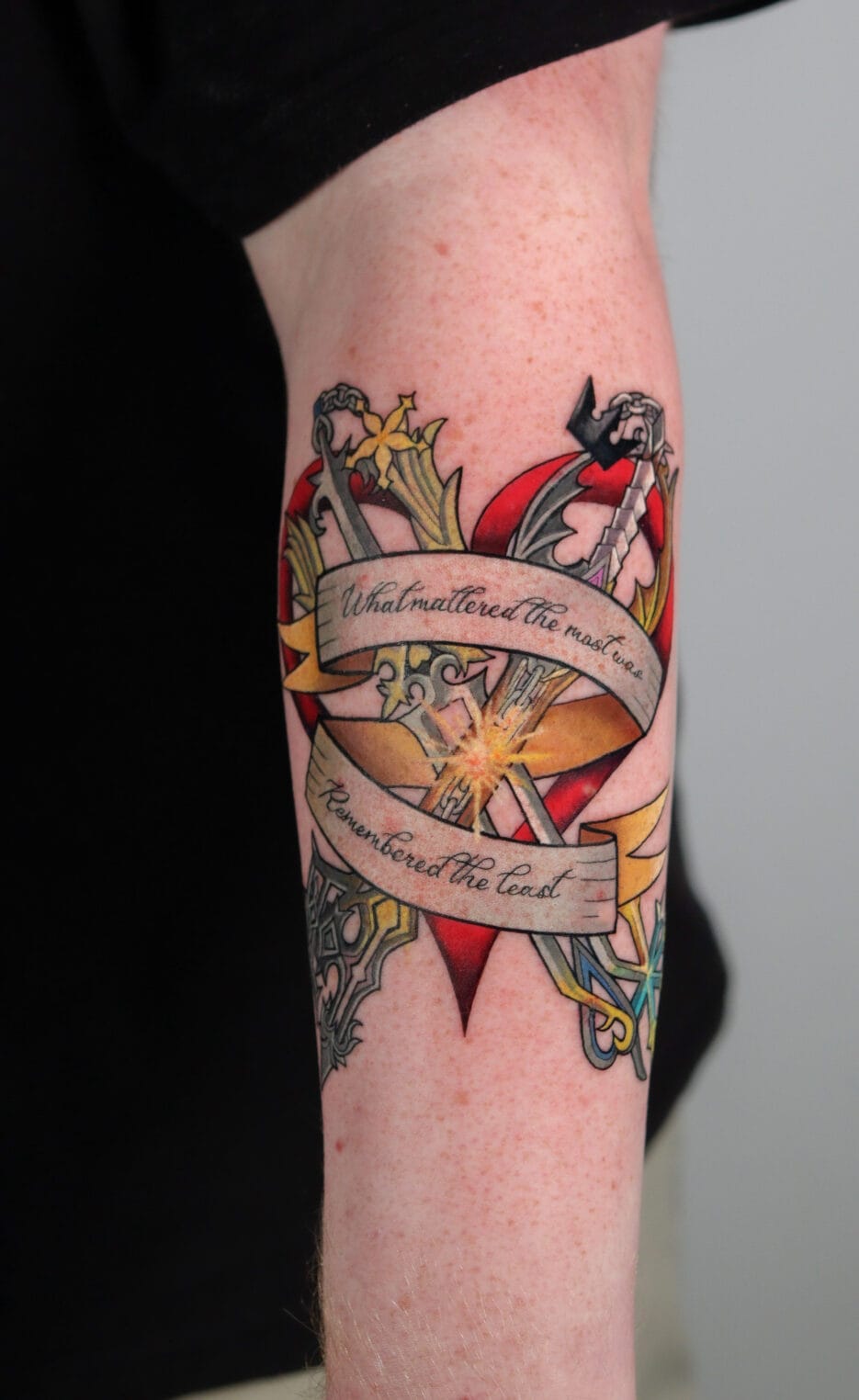 Gamer Tattoo on Forearm with Swords and Heart Design - Best tattoo shop ...