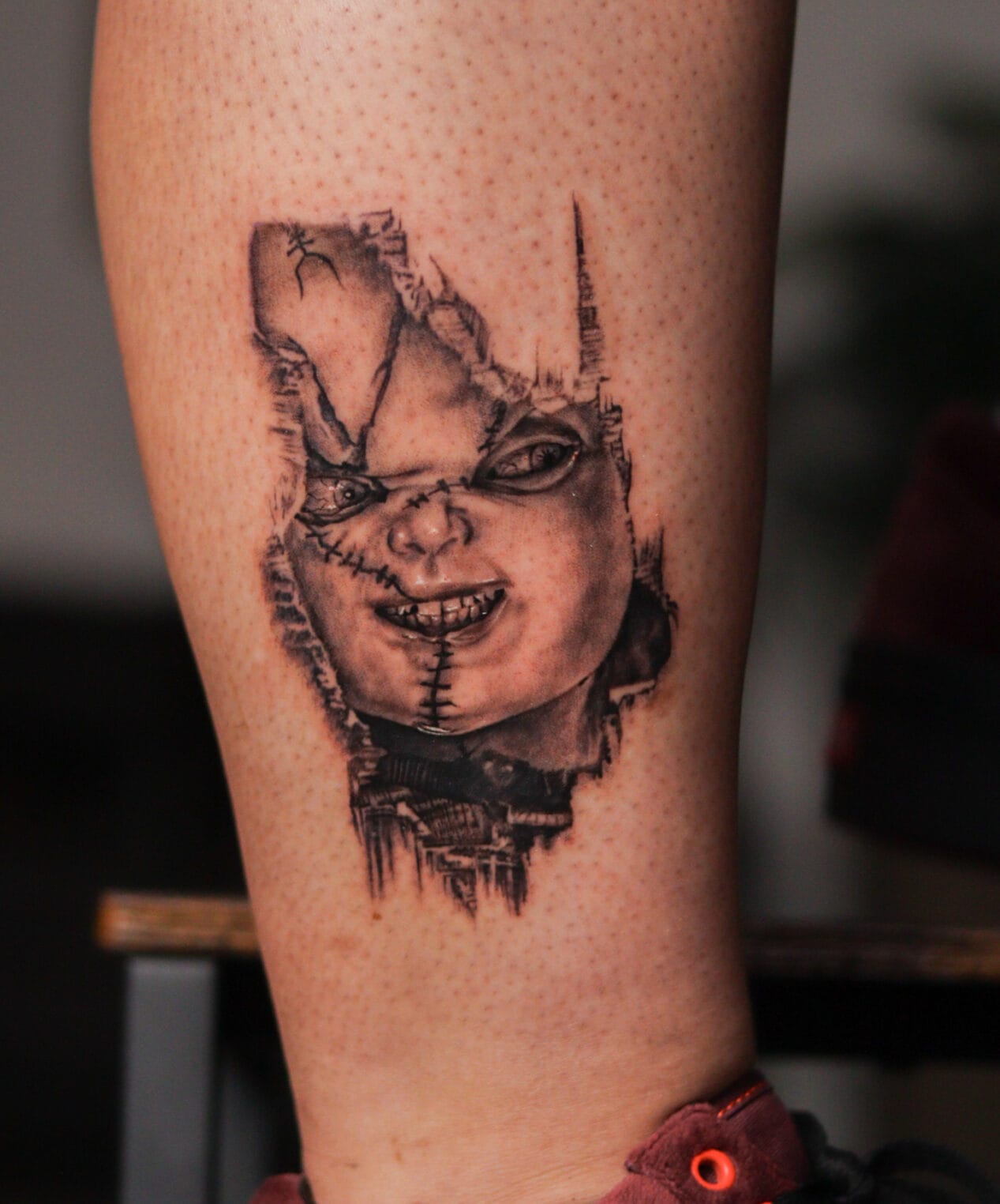 Realistic Chucky portrait tattoo on Leg - Best tattoo shop in Los ...