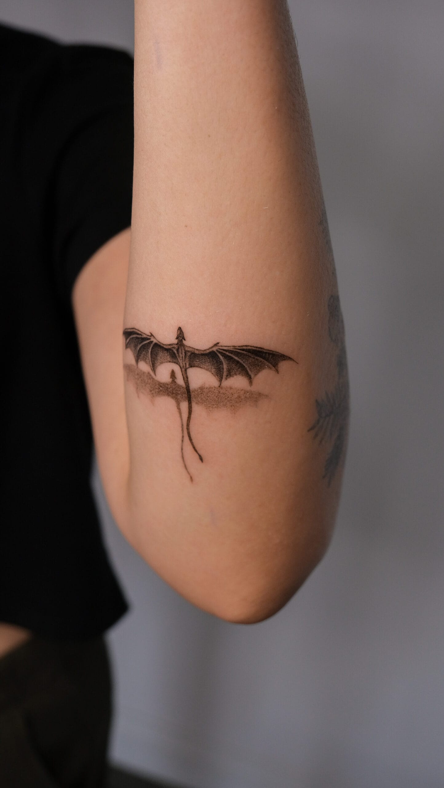 Small Flying Dragon Tattoo with 3D Effect on Forearm - Best tattoo shop ...