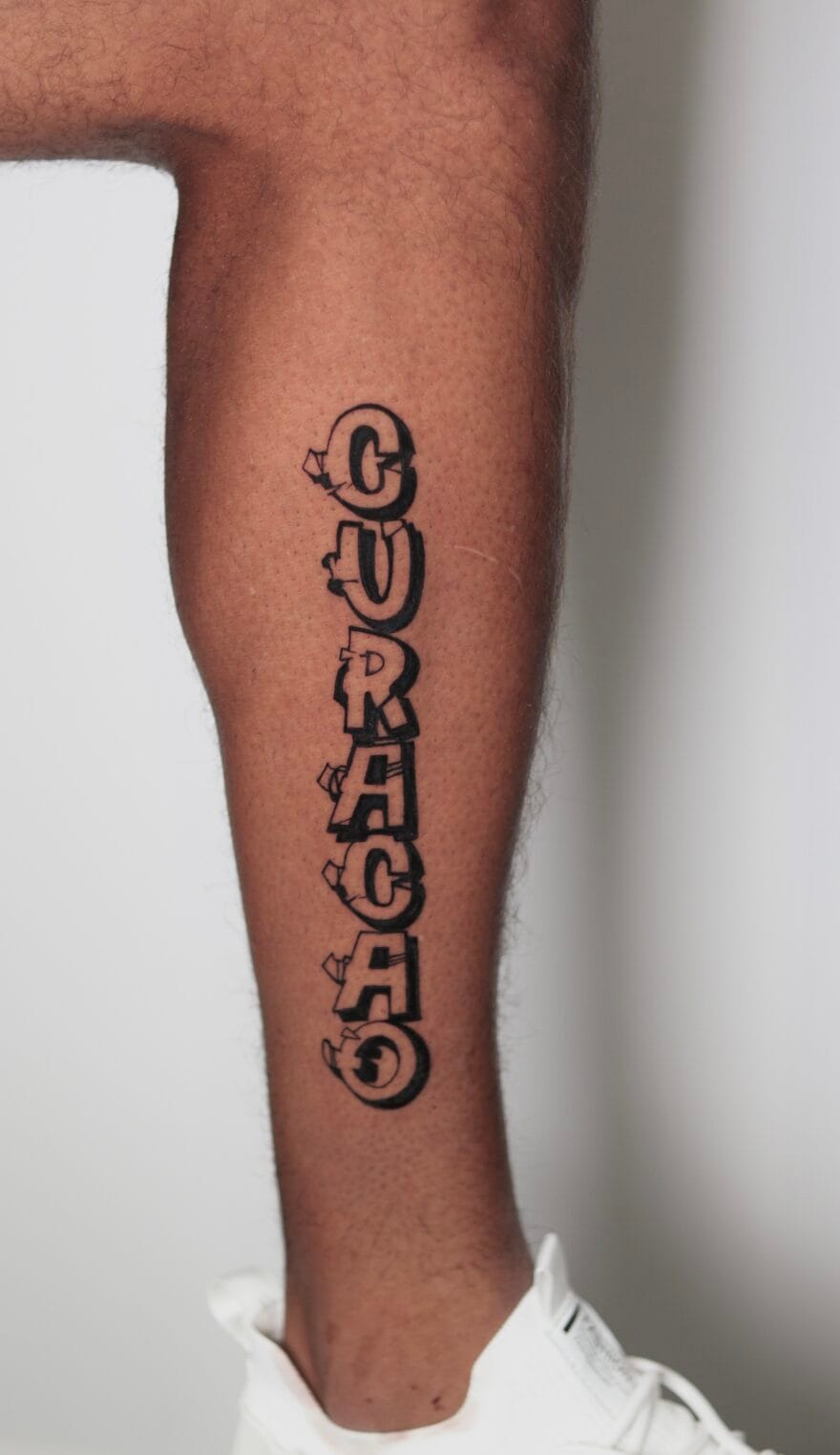 Bold Lettering Tattoo on Lower Leg - Best tattoo shop in Los Angeles ...
