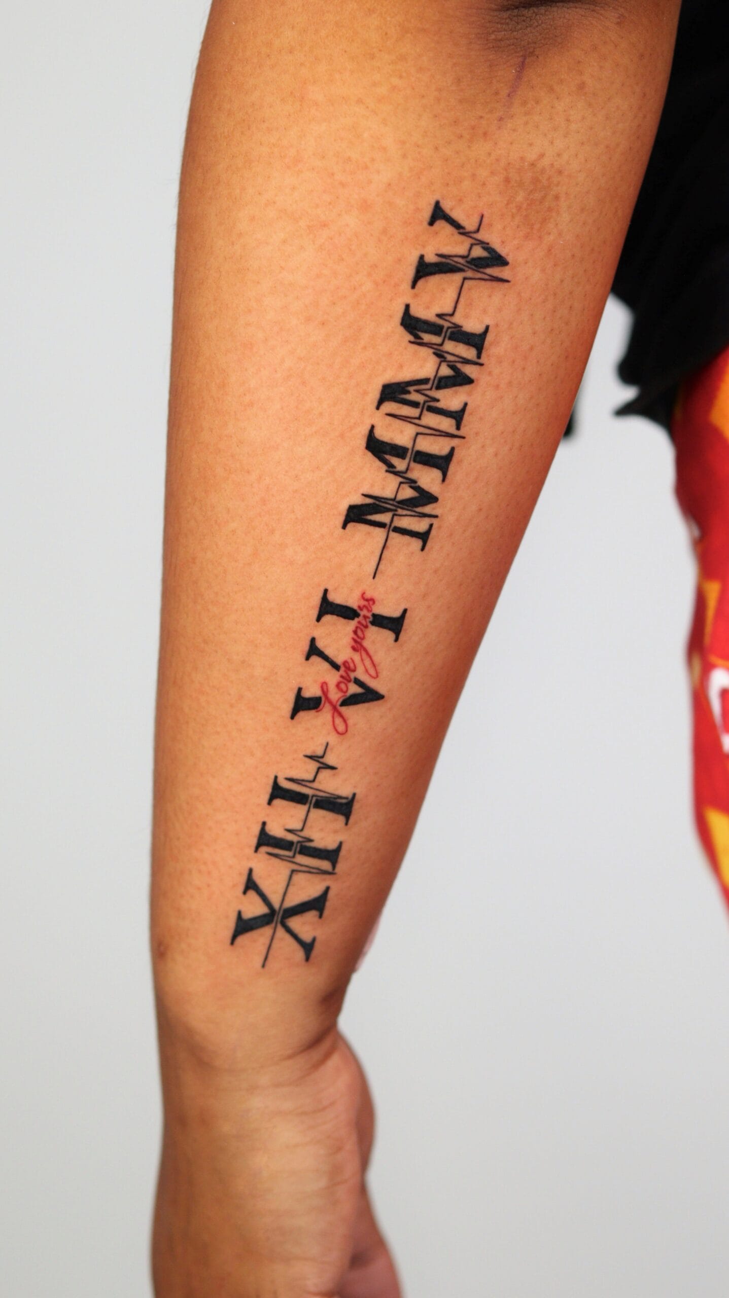 Roman Numerals Tattoo on Forearm With a Heartbeat - Best tattoo shop in ...