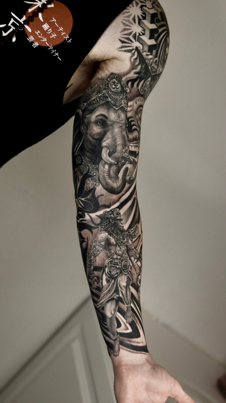 Full Sleeve India-Inspired Tattoo with Symbols and Geometric Patterns ...