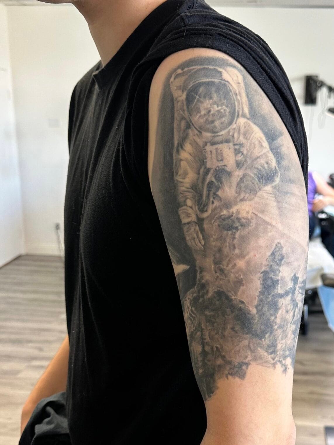 Spaceman Tattoo on Shoulder Cover Up Work - Best tattoo shop in Los ...